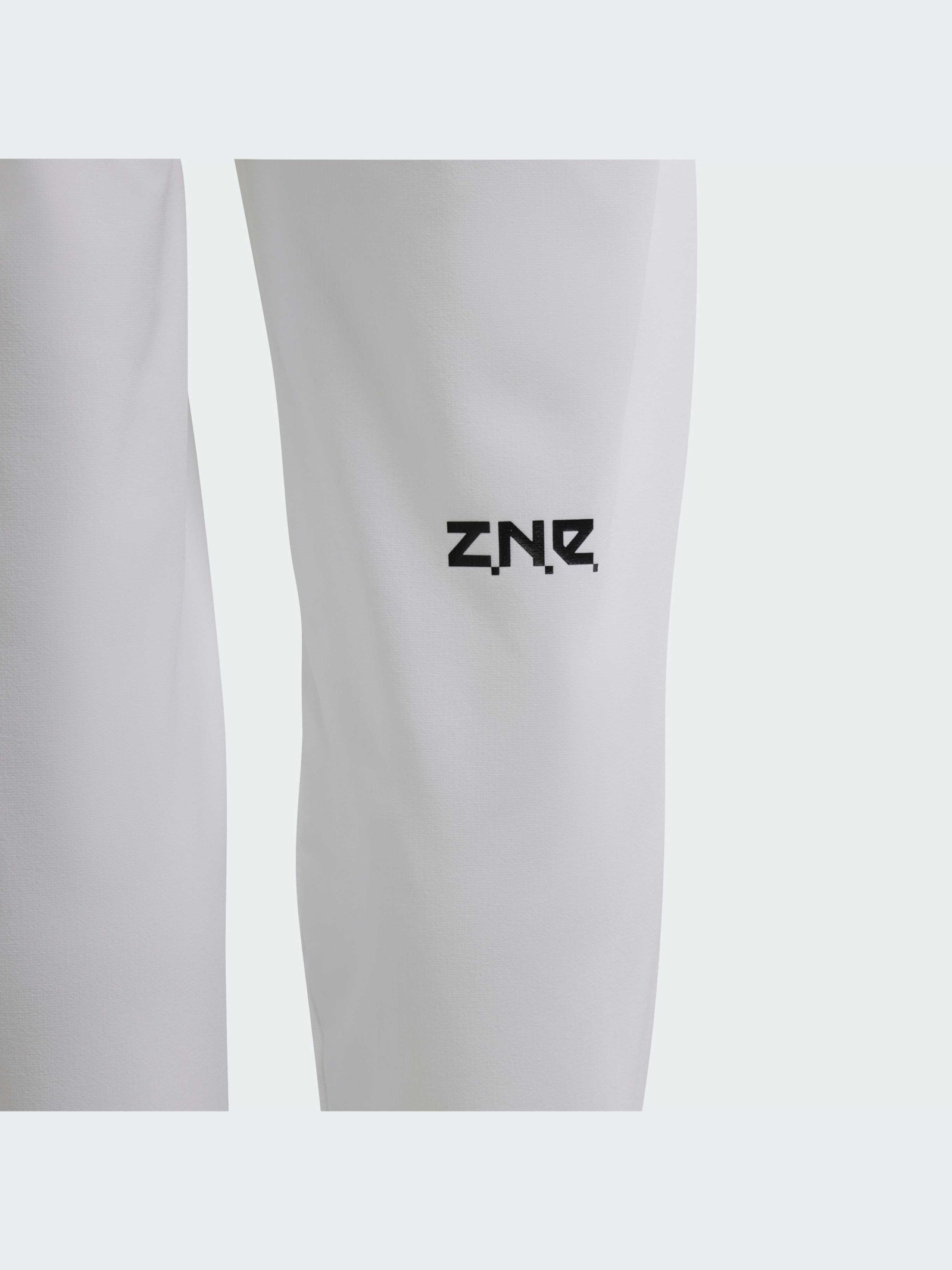 Джоггеры Adidas ZNE IM8401-KZ для детей, цвет: Белый - купить по ...