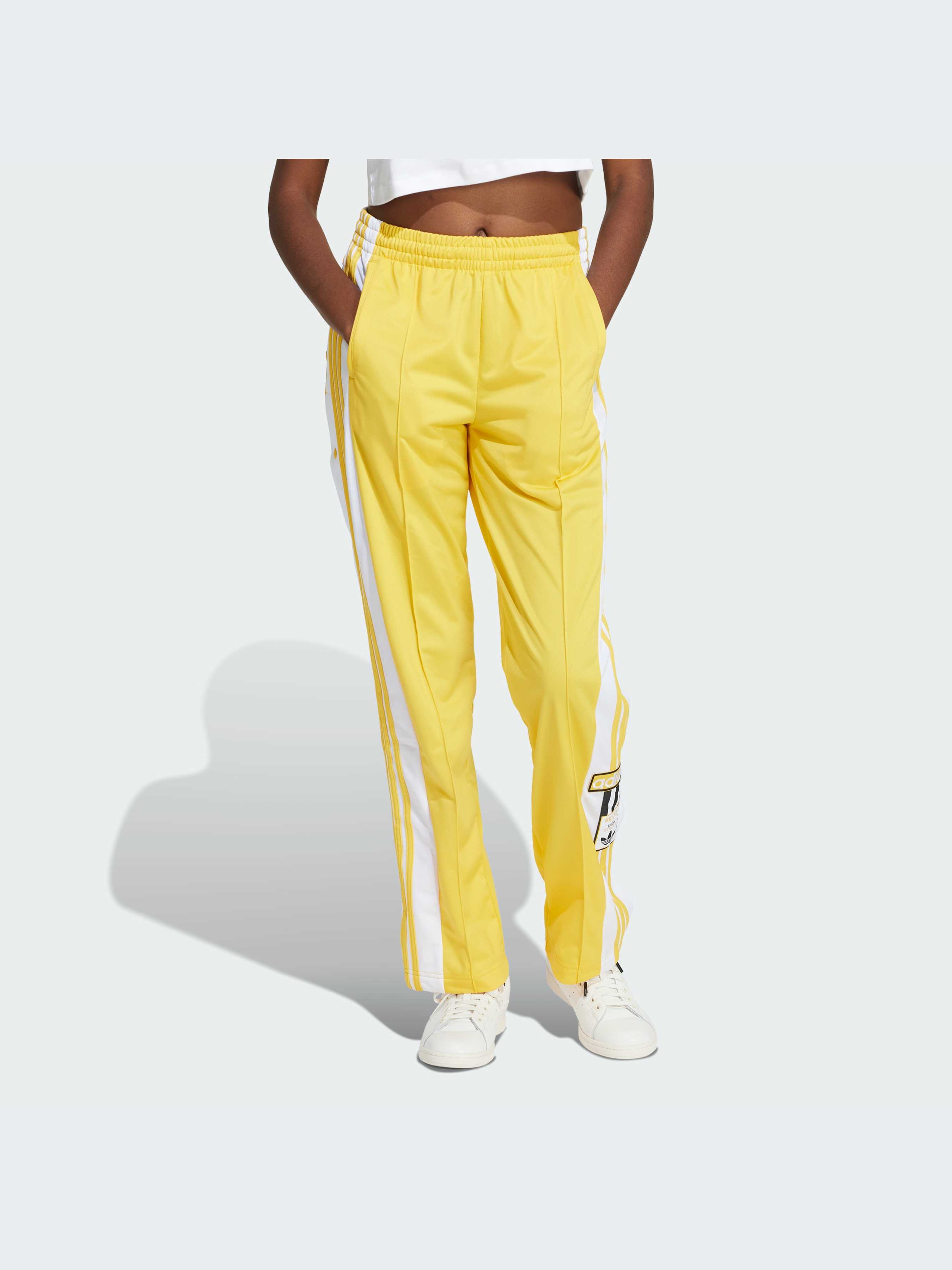 Штани повсякденні adidas Adicolor IP0622 для жінок, колір: Золотий ...